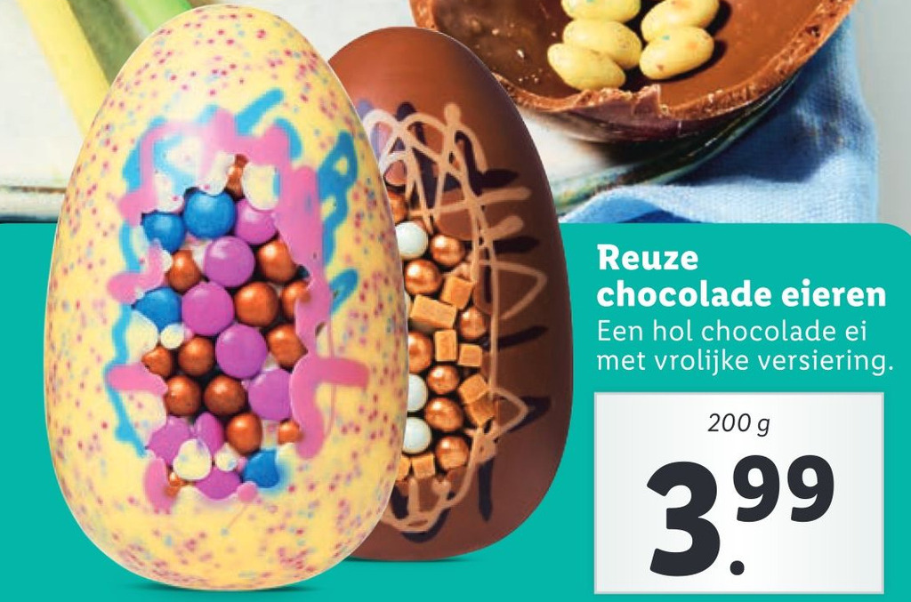 Reuze chocolade eieren Een hol chocolade ei met vrolijke versiering ...